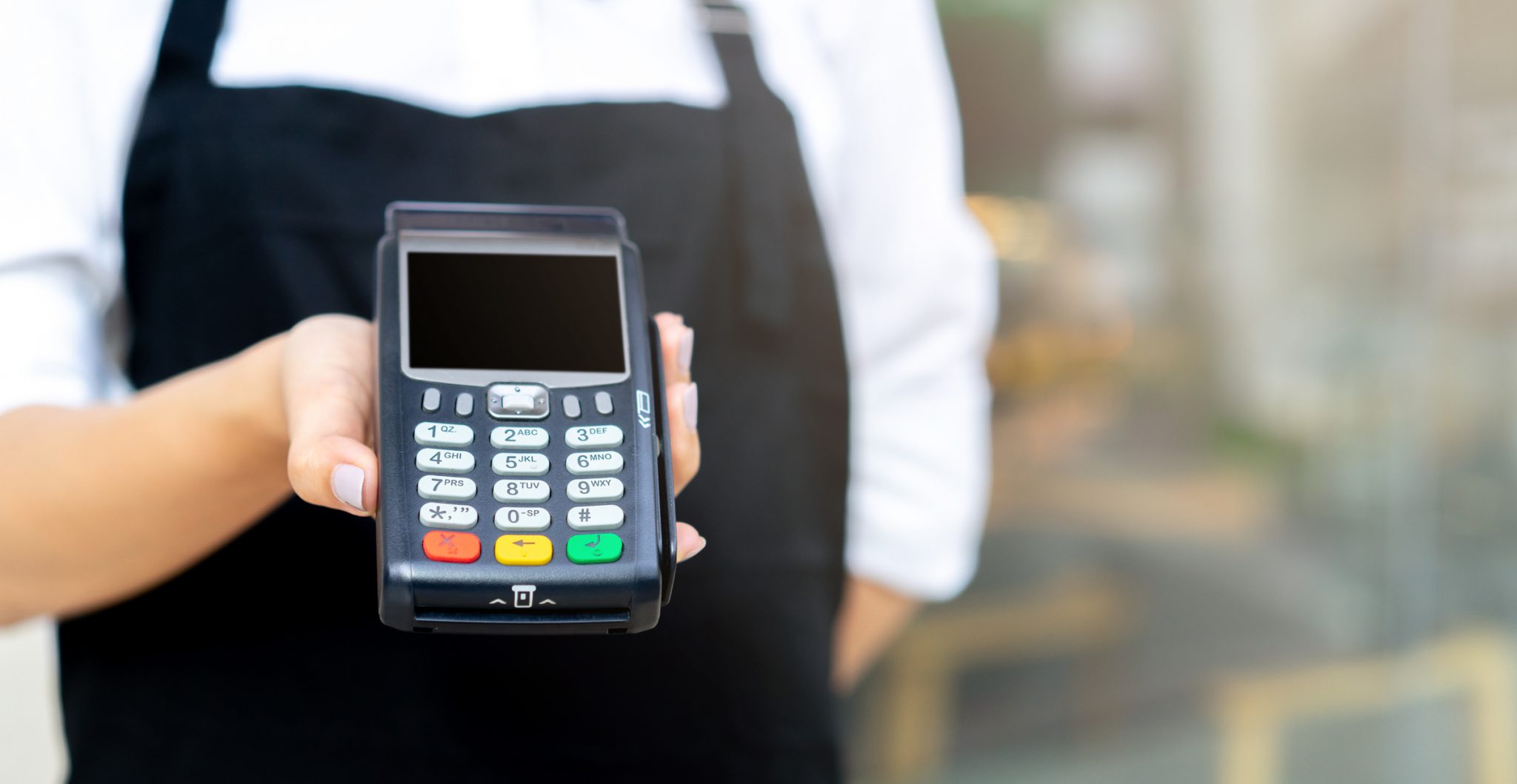 close up waitress worker hand showing an electronic banking money ...